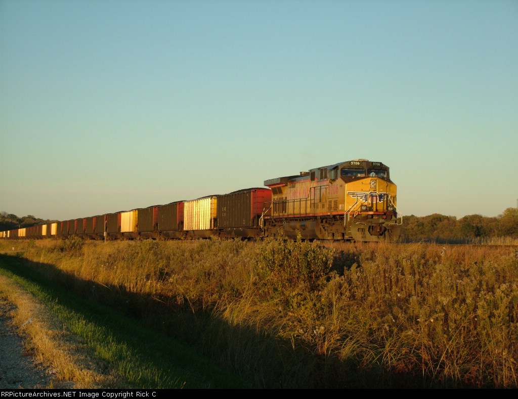UP 5706 is a EB DPU On A CWEX Coal Train